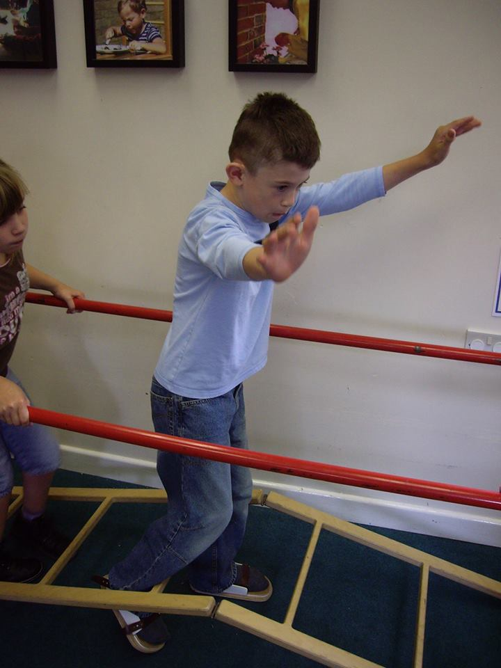 Conductive education walking class, learning to step up, balance and ...